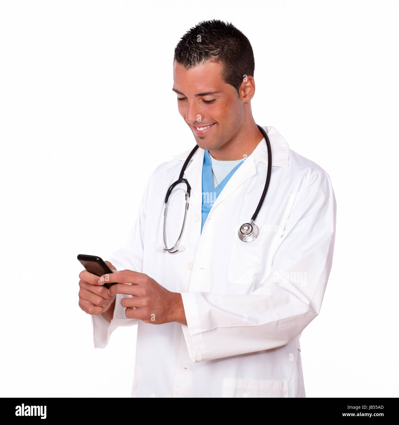 Portrait of medical male doctor sending a message with his cellphone ...