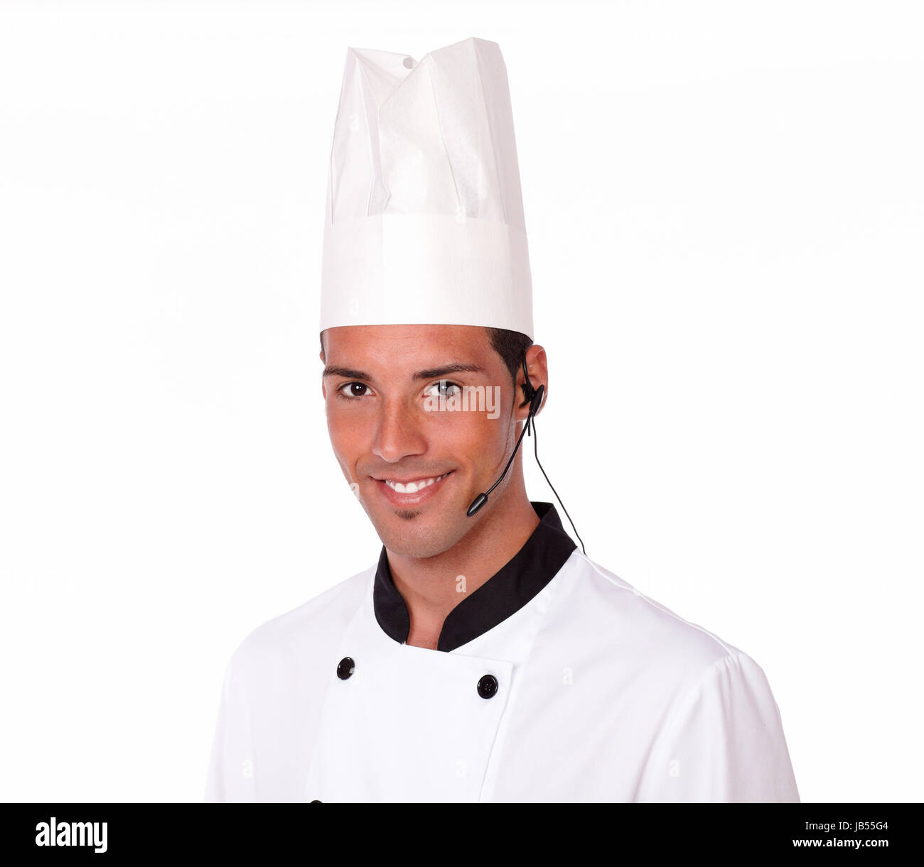 Portrait of young latin chef on white uniform talking on microphone ...