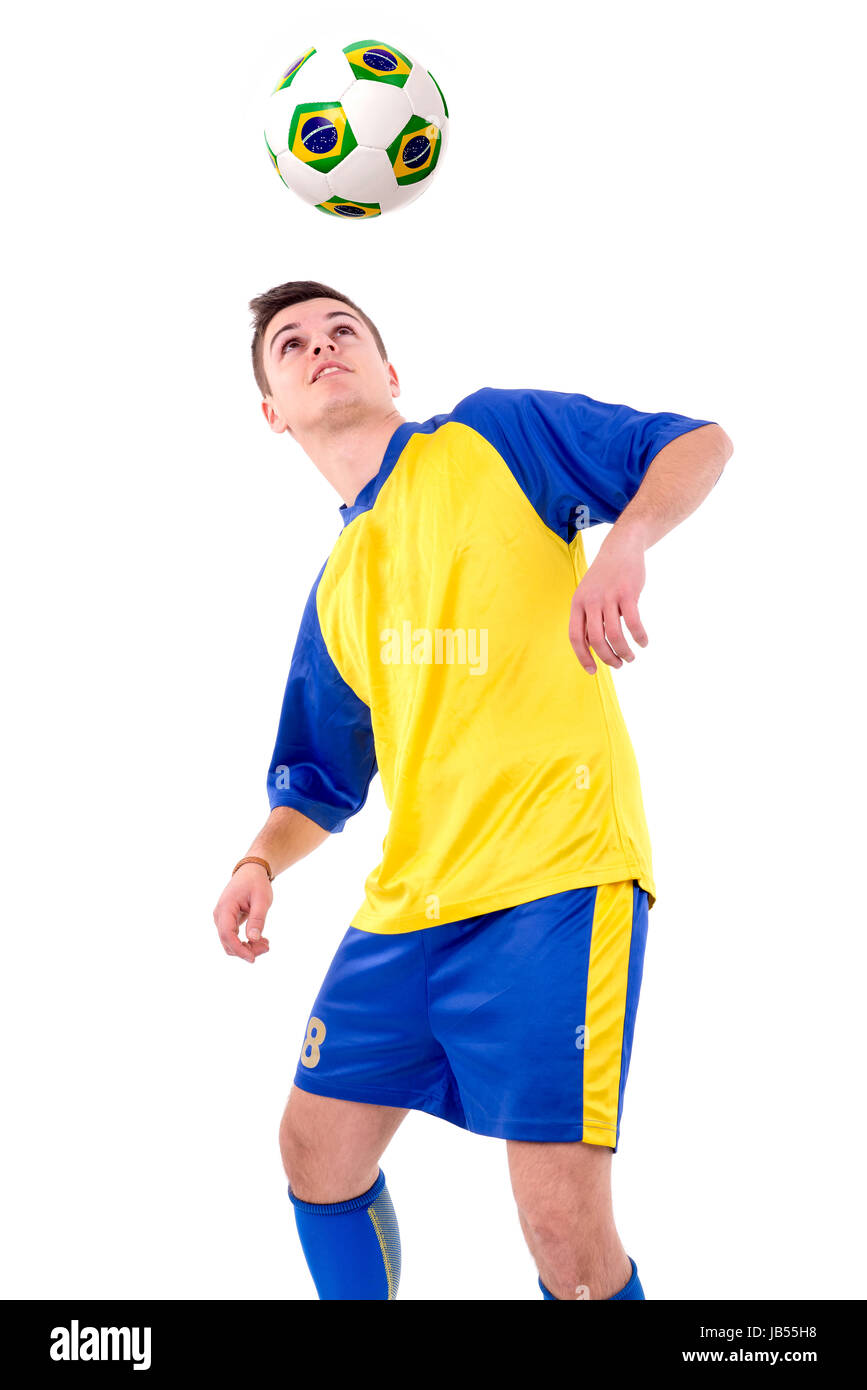 Football player with ball isolated in white Stock Photo - Alamy