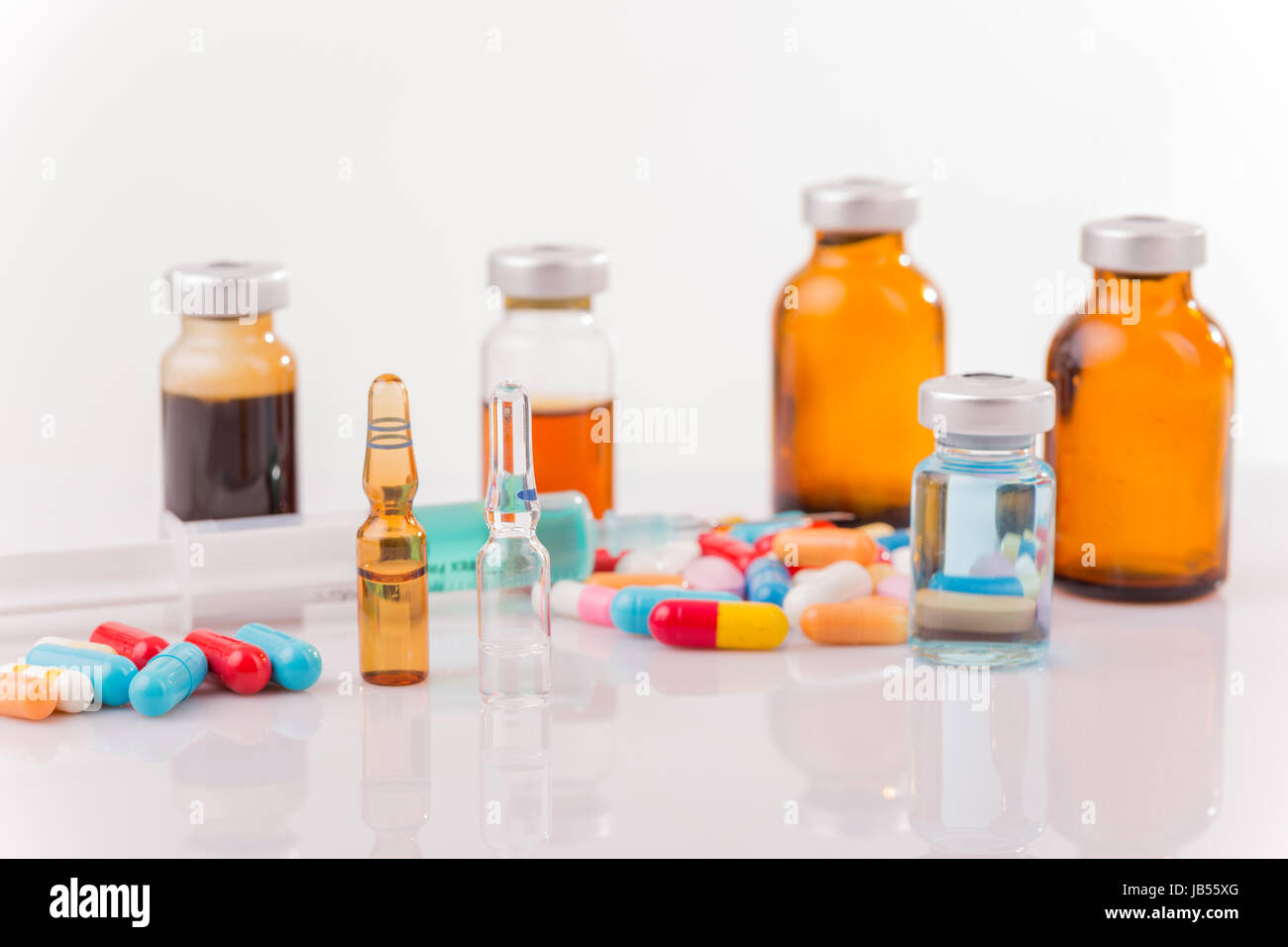 Different types of drugs on white background Stock Photo - Alamy