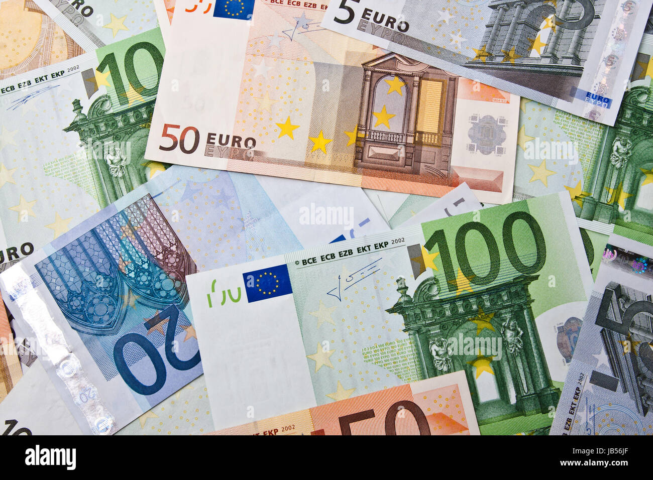 Many euro banknotes making european currency background Stock Photo - Alamy