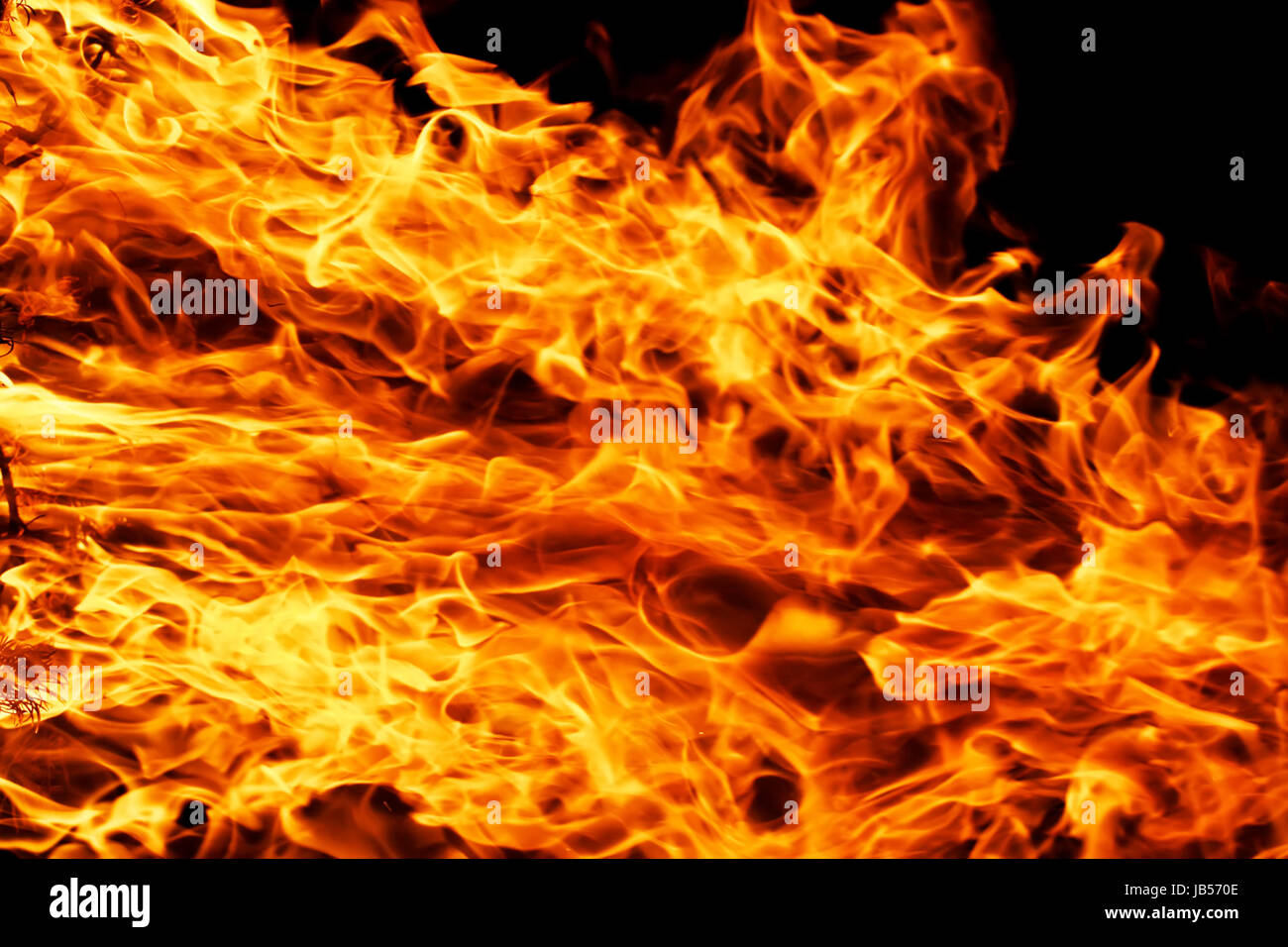 Beautiful yellow and orange hot fire on black background Stock Photo ...