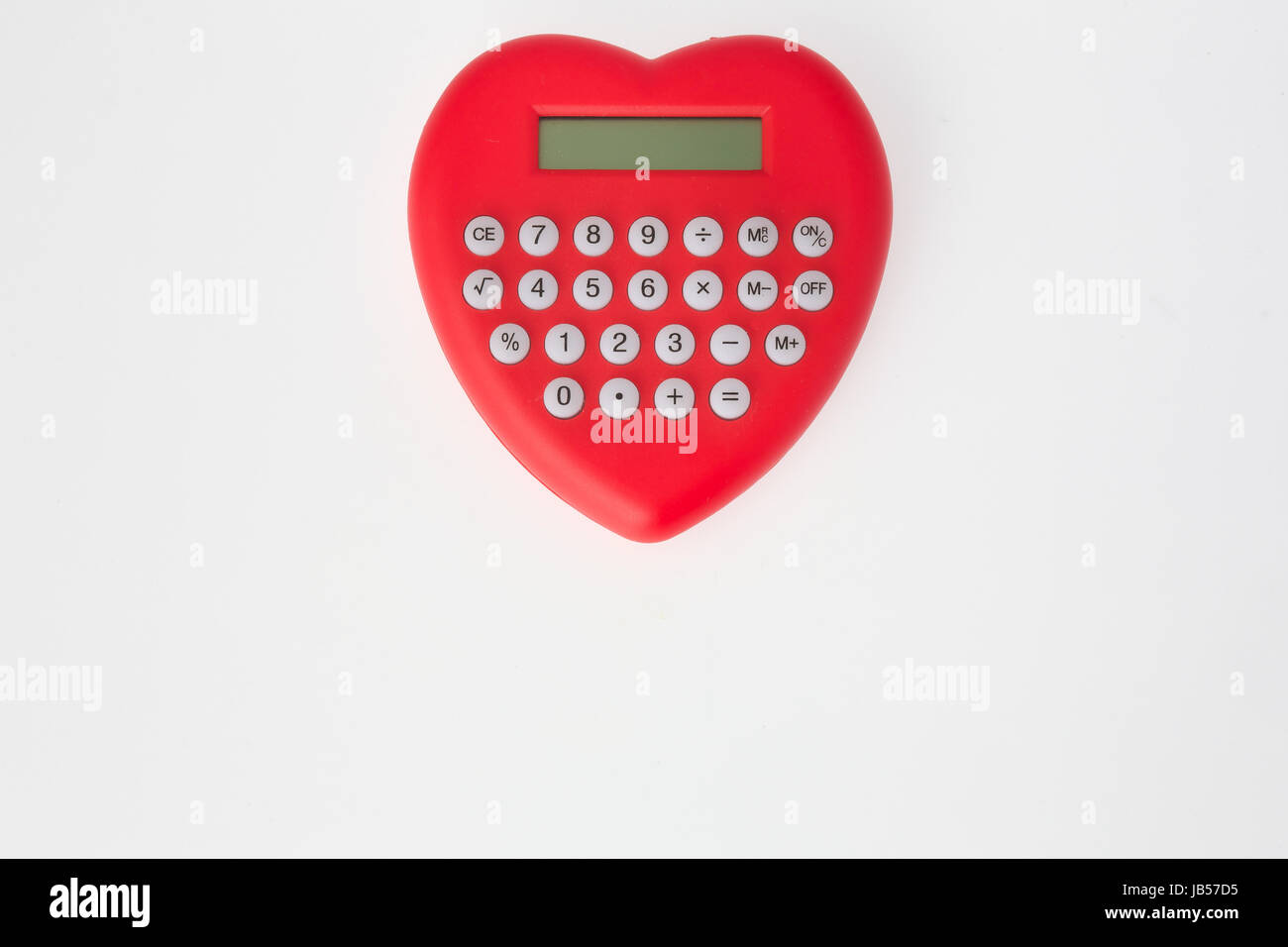 A red calculator shaped like a heart. Isolated on white background ...