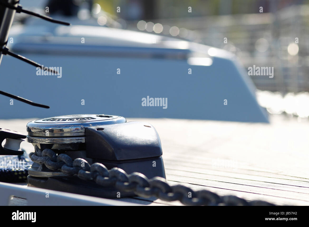 Anchor chain on deck of small sailing boat Stock Photo - Alamy