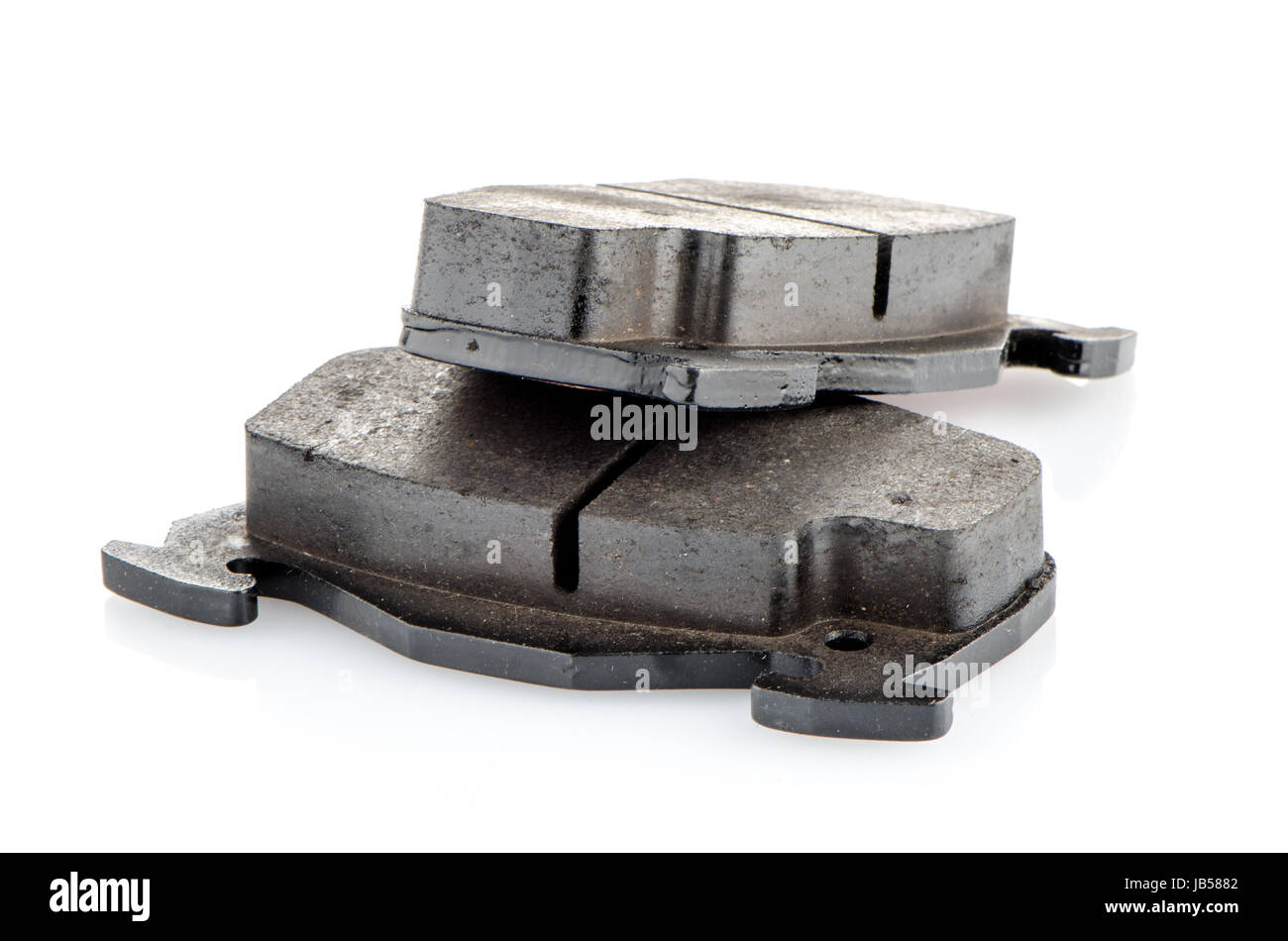 Car brake pads on white reflective background Stock Photo - Alamy