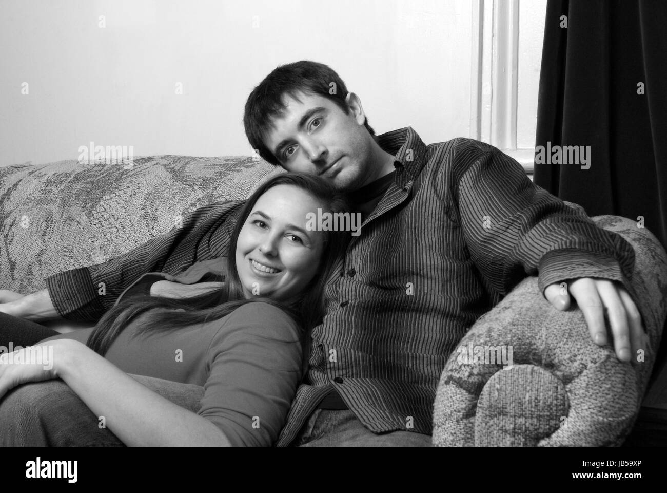 Couple cuddling embracing Black and White Stock Photos & Images - Alamy