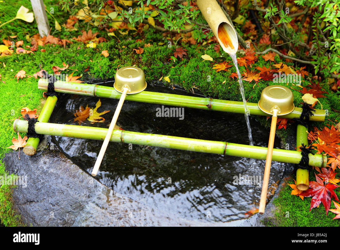 Water fountain in Japan temple Stock Photo - Alamy