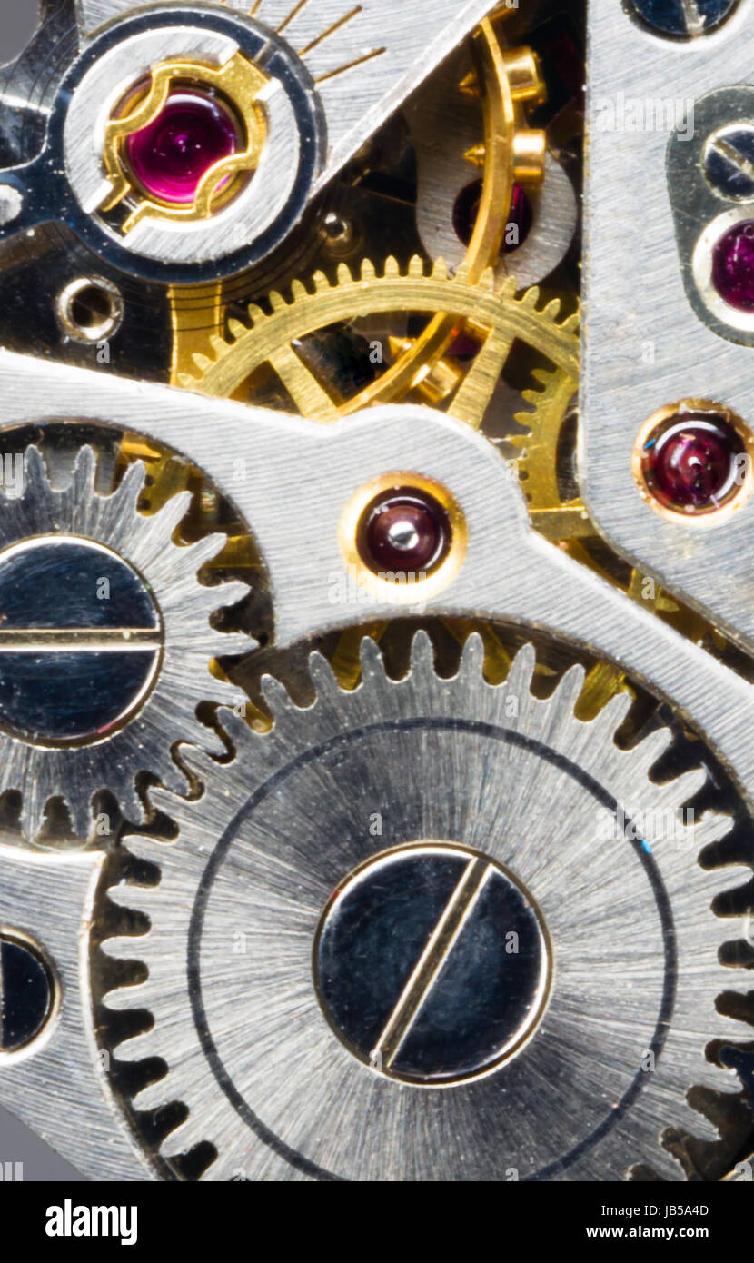 Extreme close up of the inside workings of a 17 jewels pocketwatch ...