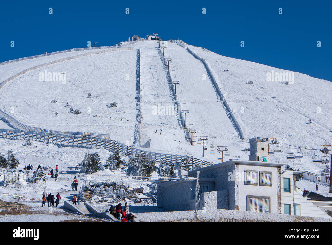 Snowy mountains and "bola del mundo" in Navacerrada, Madrid, Spain ...