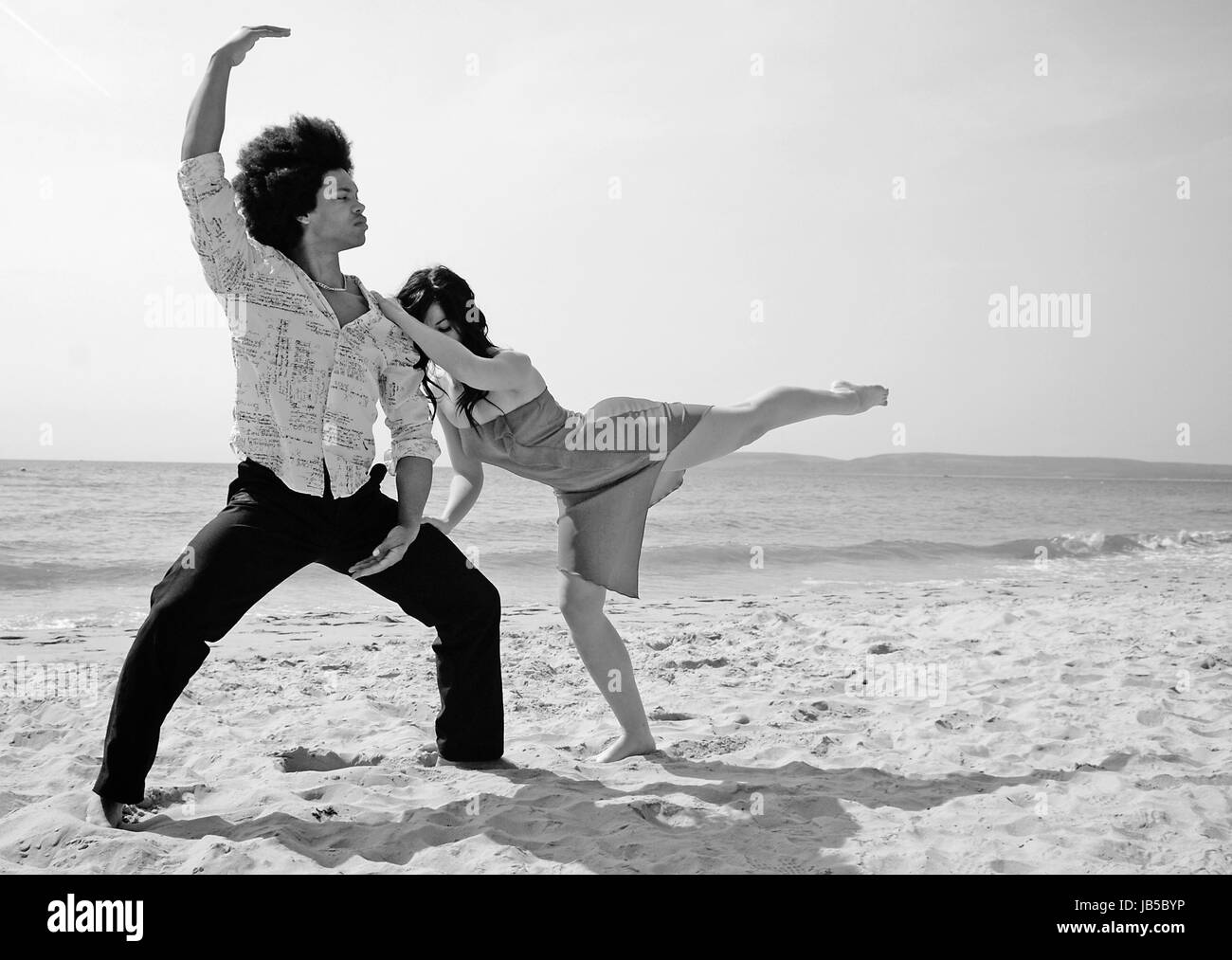 Two Dancers on the beach Stock Photo - Alamy