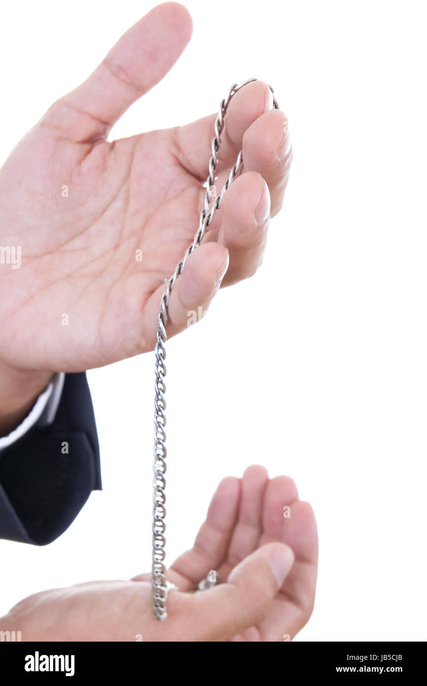 man hands holding silver necklace in studio isolated on white ...