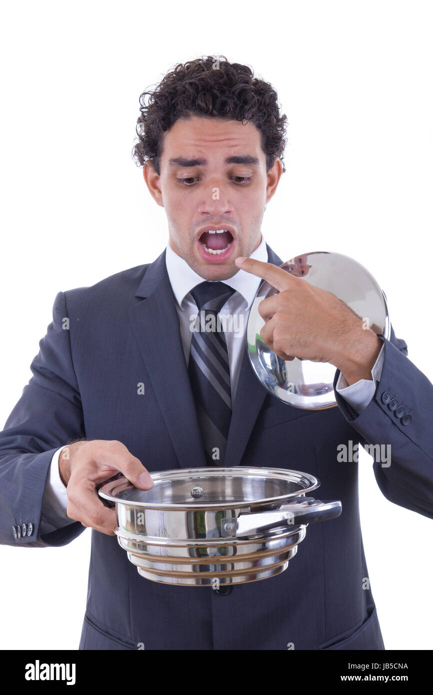 sad man with expression in suit holding cooking pot and asking for ...