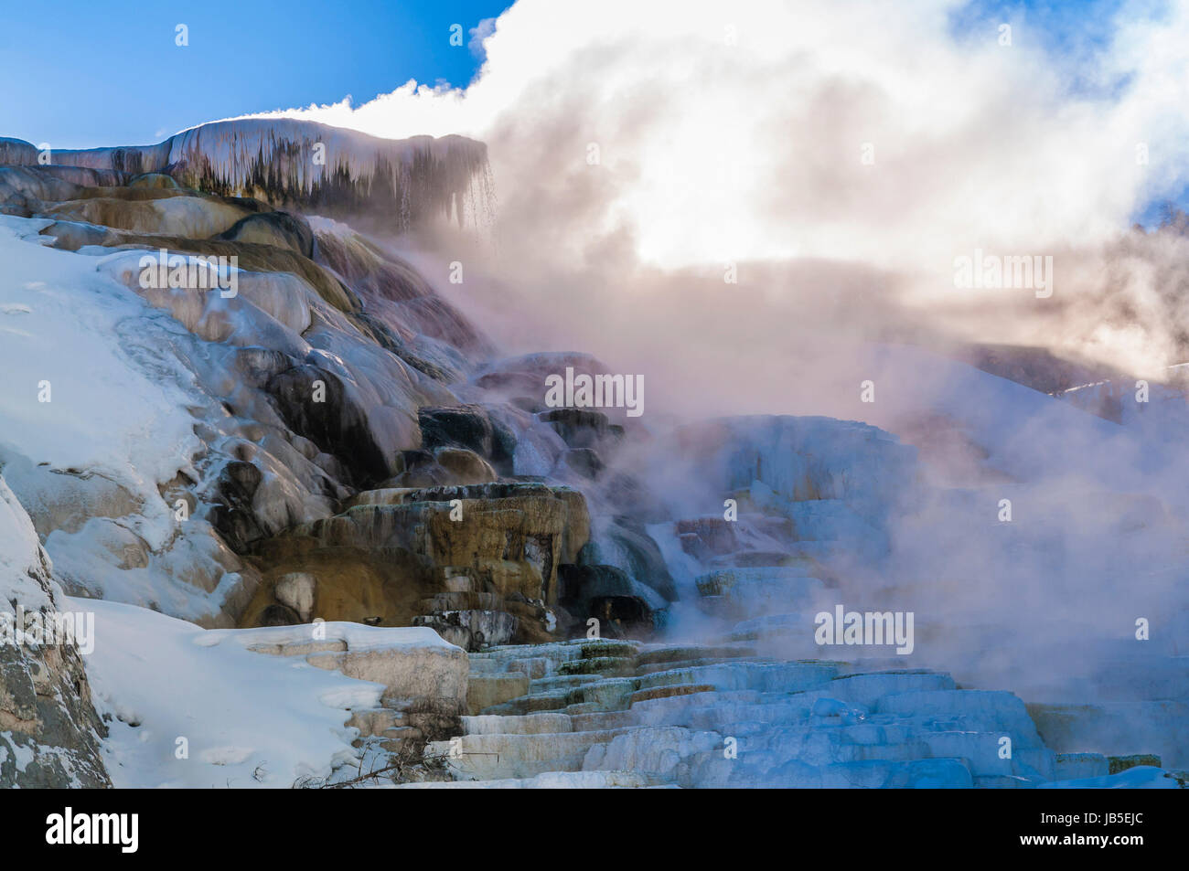 Hot steaming water beautiful cascade geyser - winter landscape in ...