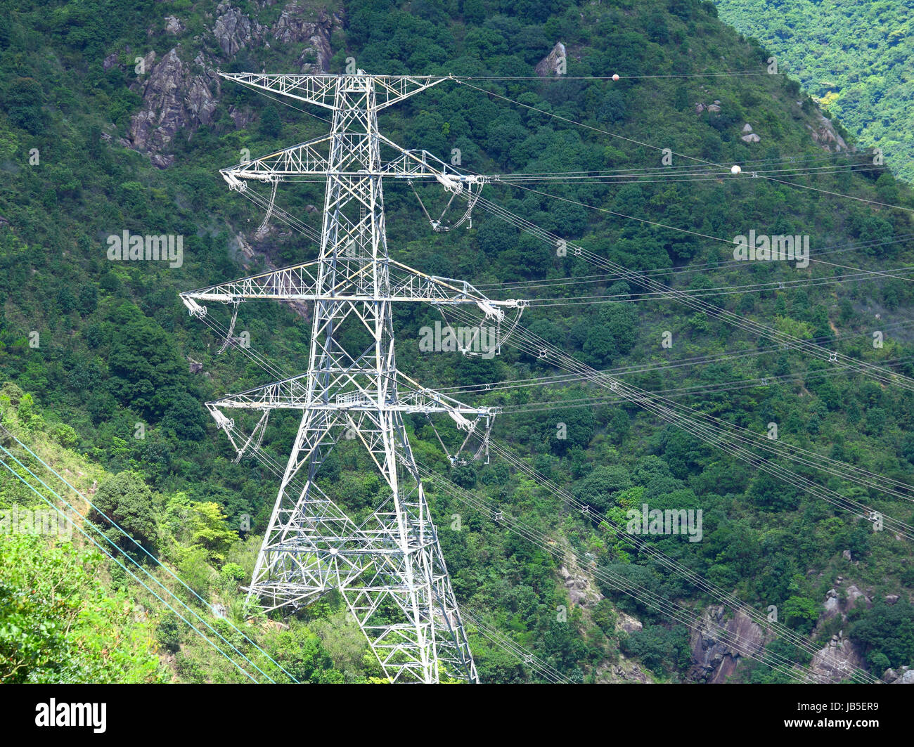 Powerline on mountain Stock Photo - Alamy