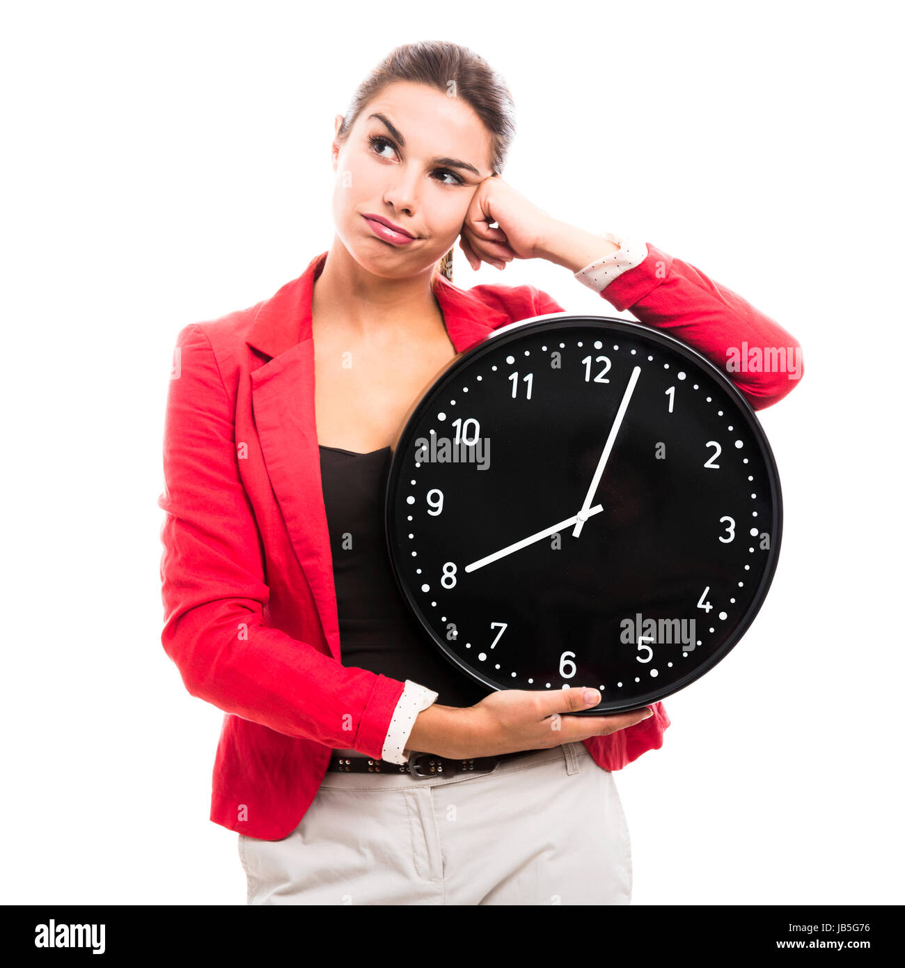 Bored business woman holding a big clock on the hands Stock Photo - Alamy