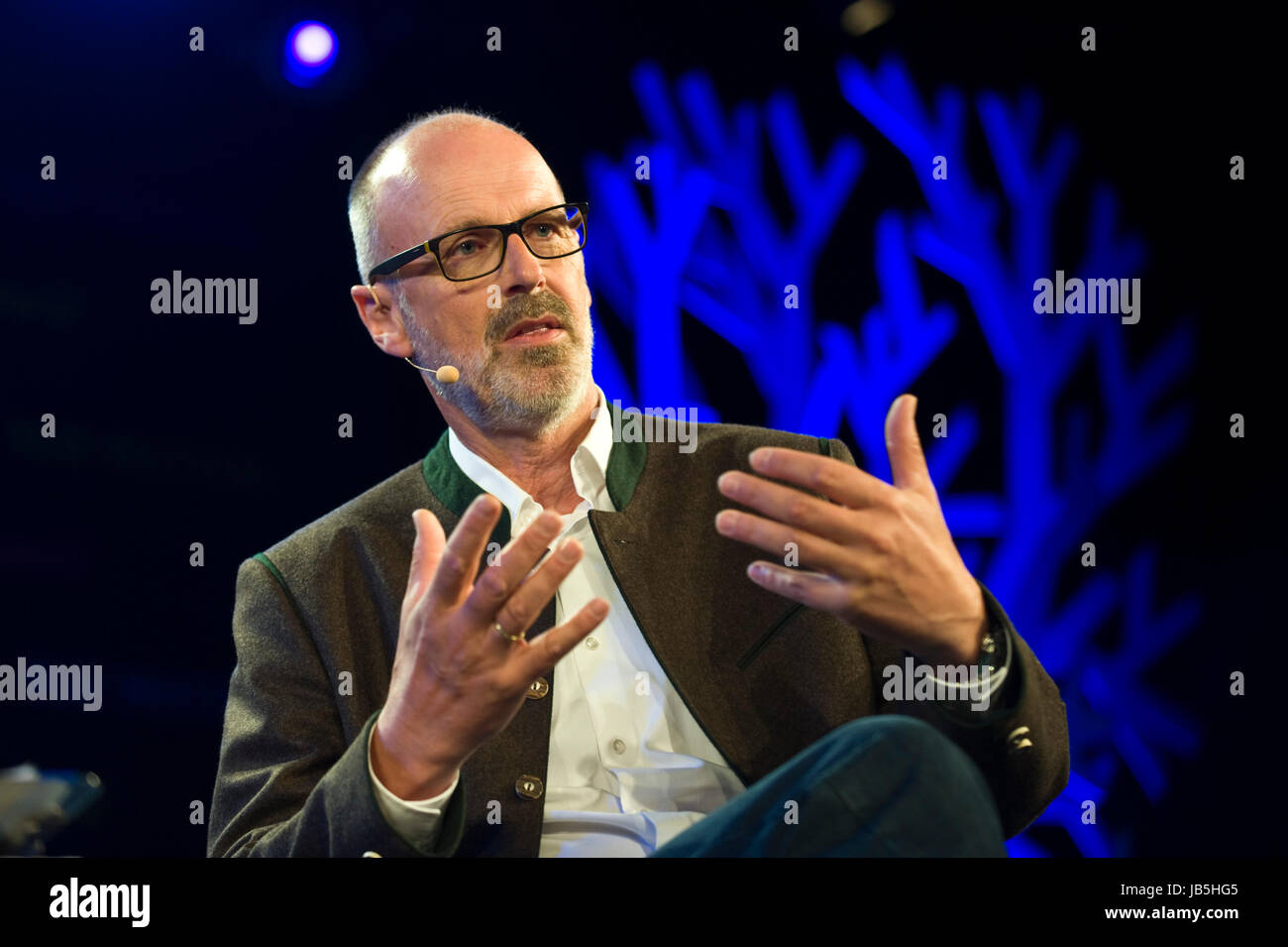 Peter Wohlleben German forester and author speaking on stage at Hay ...