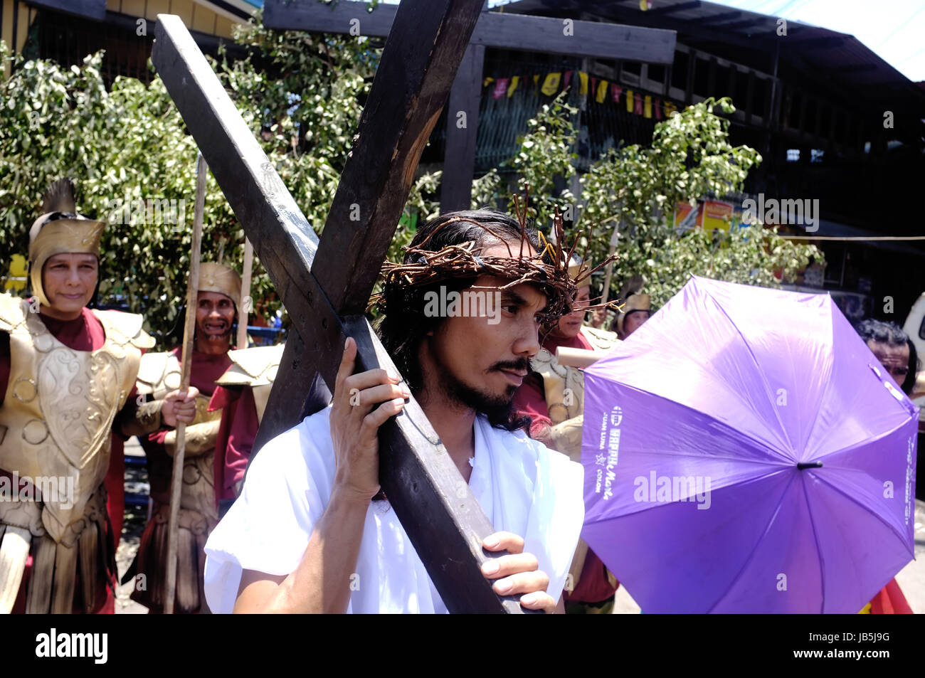 Cebu City, the Philippines - April 3, 2015. A person dressed as Jesus ...