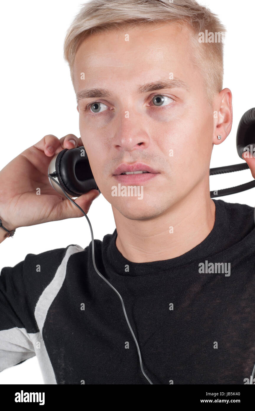 Male taking off headphones, isolated on white Stock Photo - Alamy