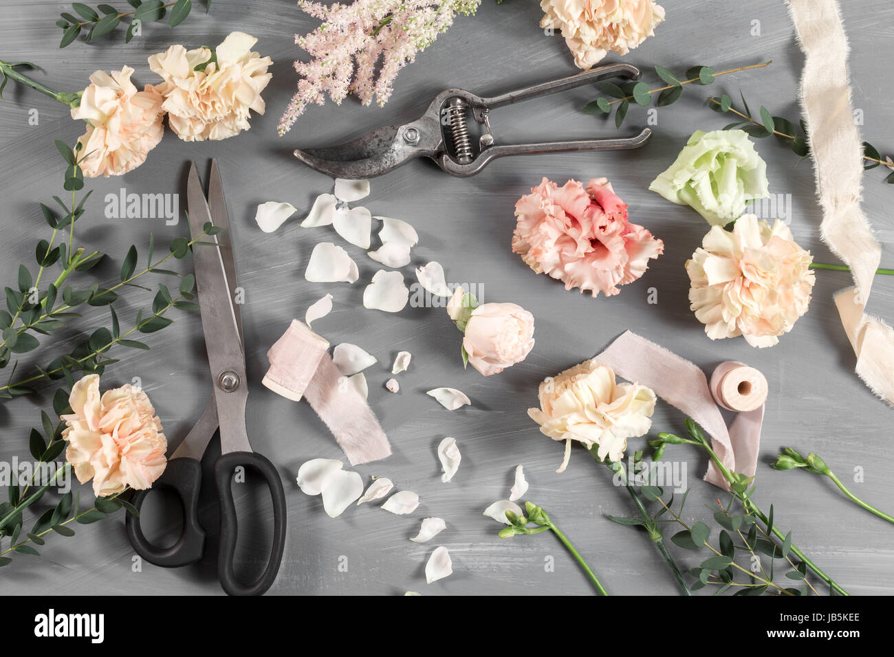 flowers and garden tools. The florist work table with accessories gray ...
