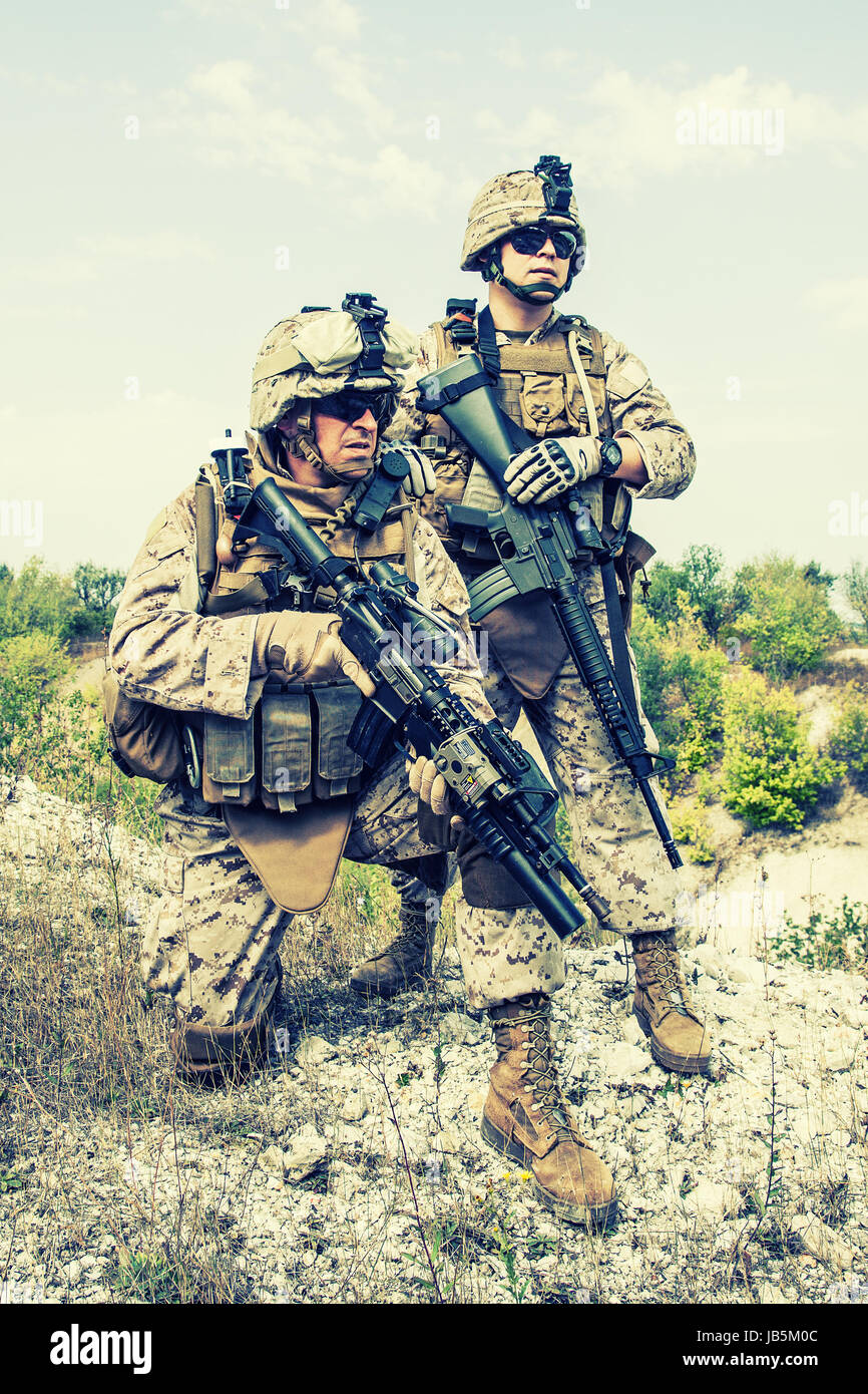 Two soldiers in the mountains during the military operation Stock Photo ...