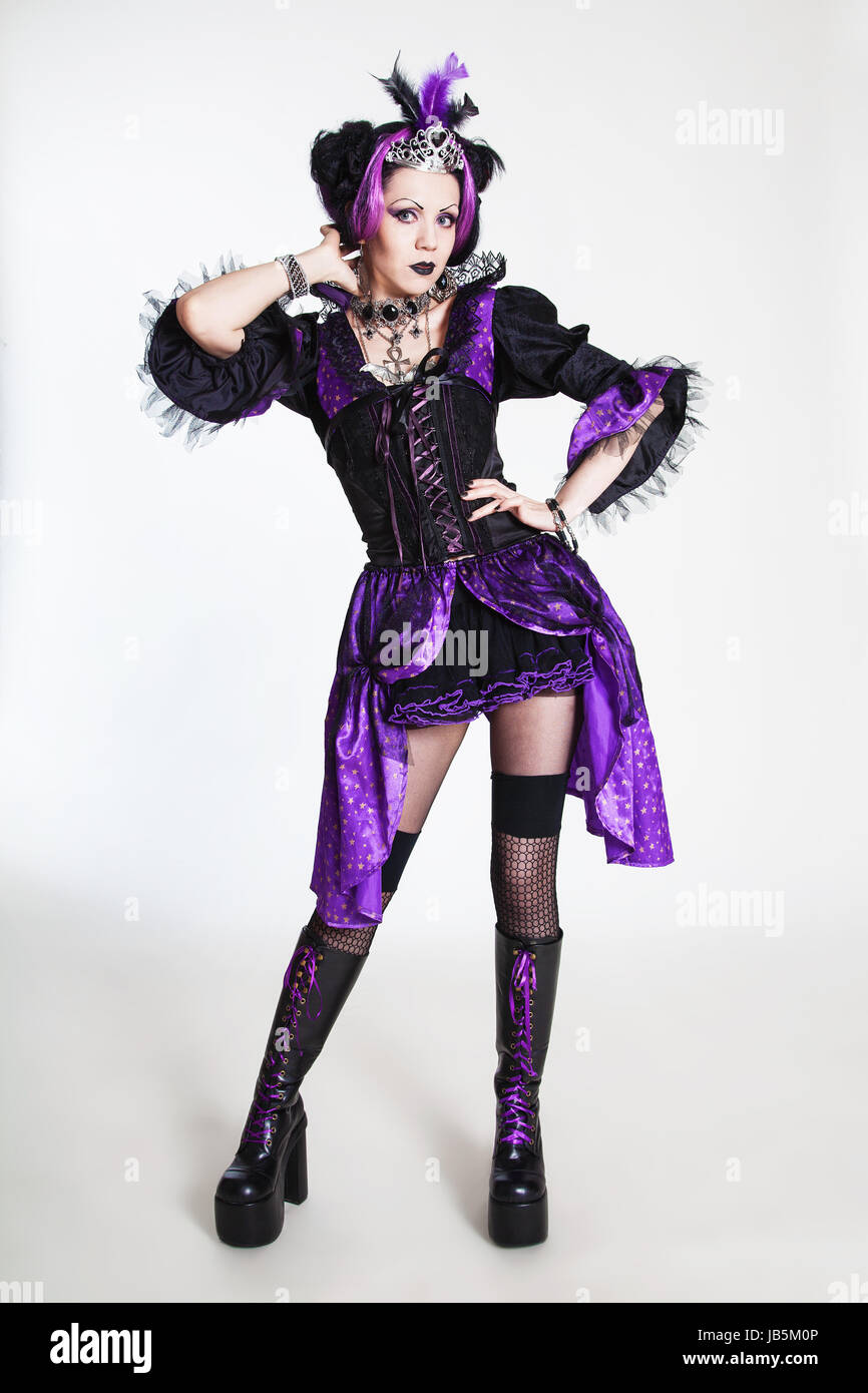 Young goth girl dressing a weird clothes in violet tones Stock Photo ...