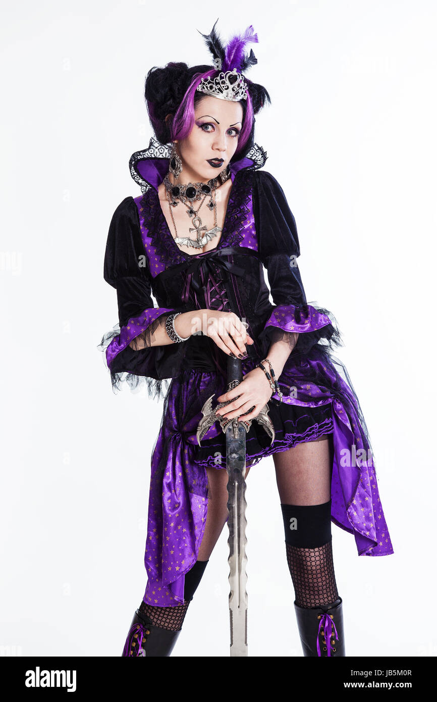 Young goth girl dressing a weird clothes in violet tones Stock Photo ...