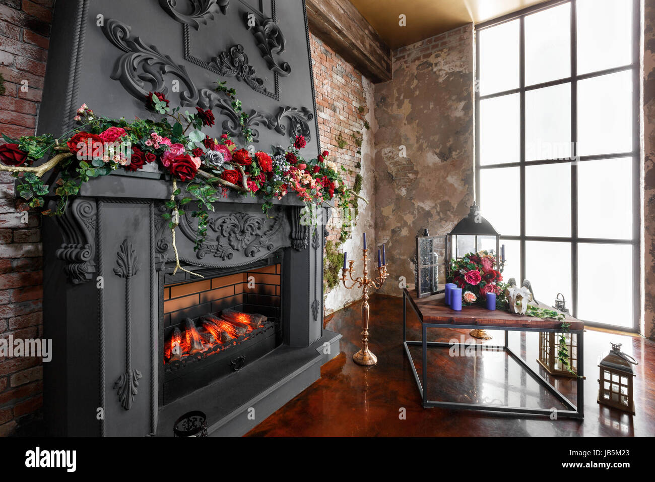 Interior loft with fireplace in modern design Stock Photo - Alamy