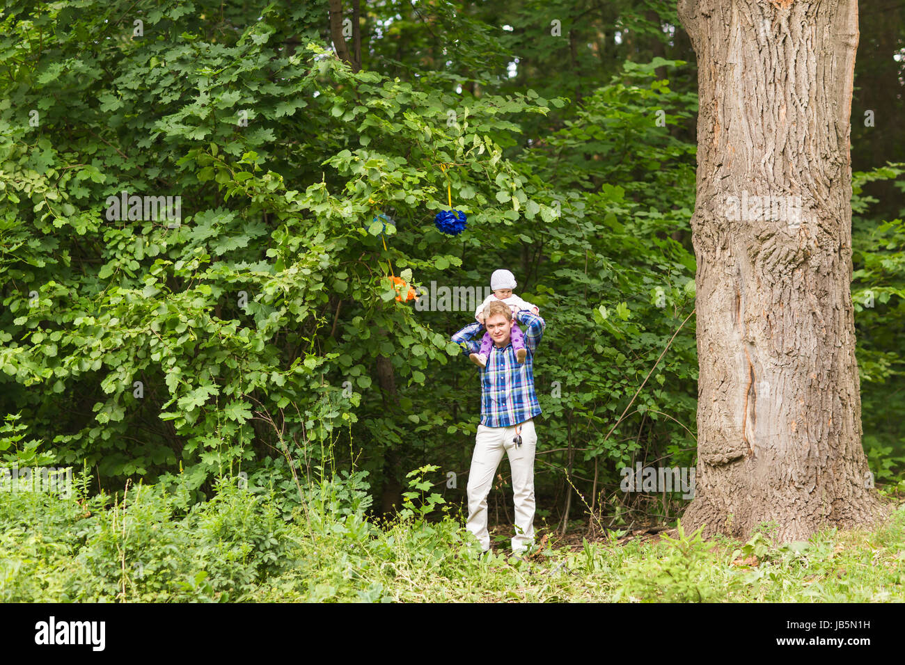 Piggyback of baby and dad. Father Giving Daughter Piggyback Ride Stock ...