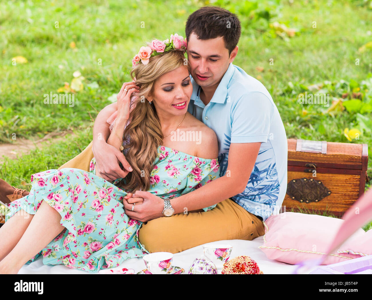 Beautiful Young Couple Having Picnic in Countryside. Happy Family ...