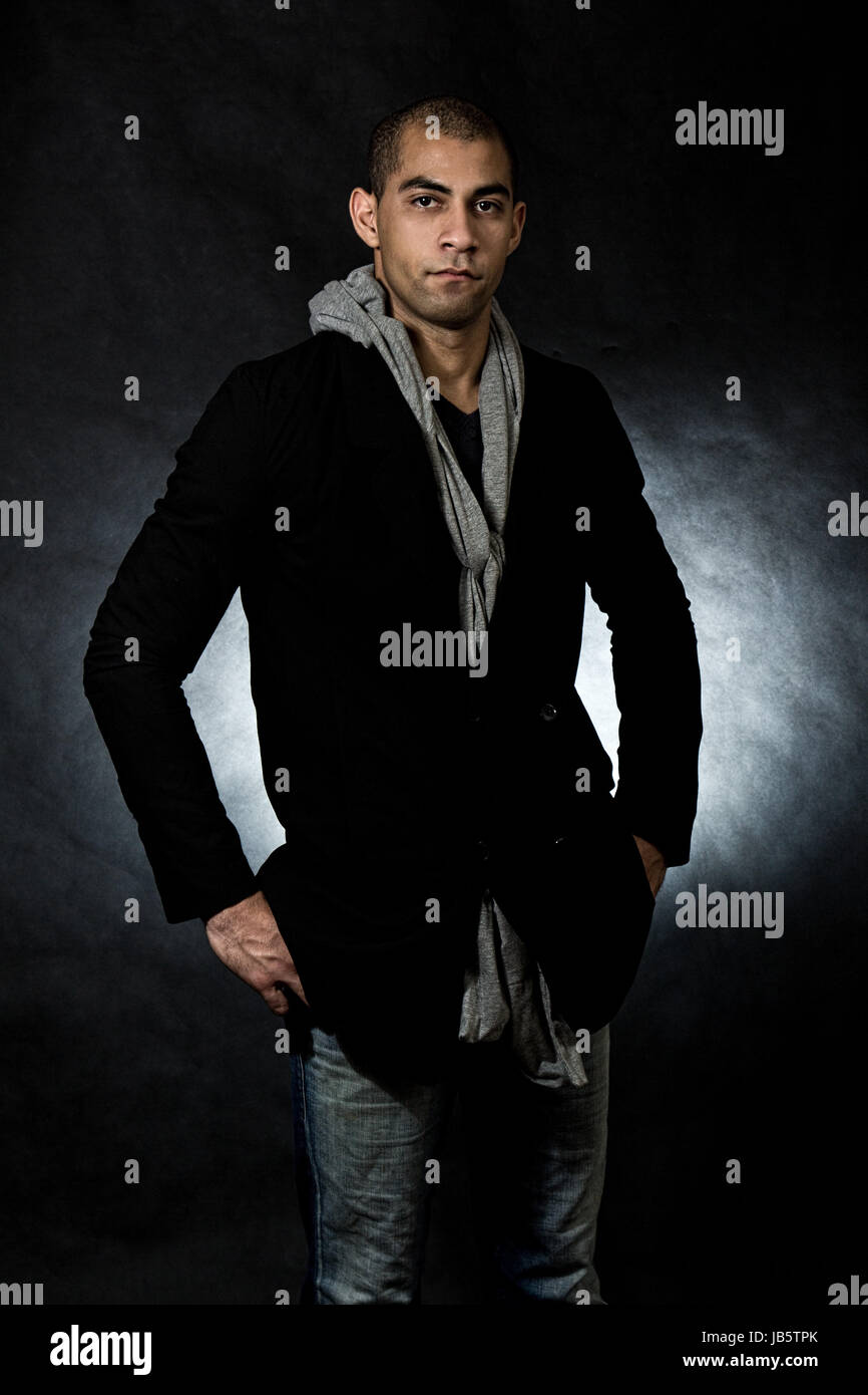 Handsome mixed hispanic african american man Stock Photo - Alamy