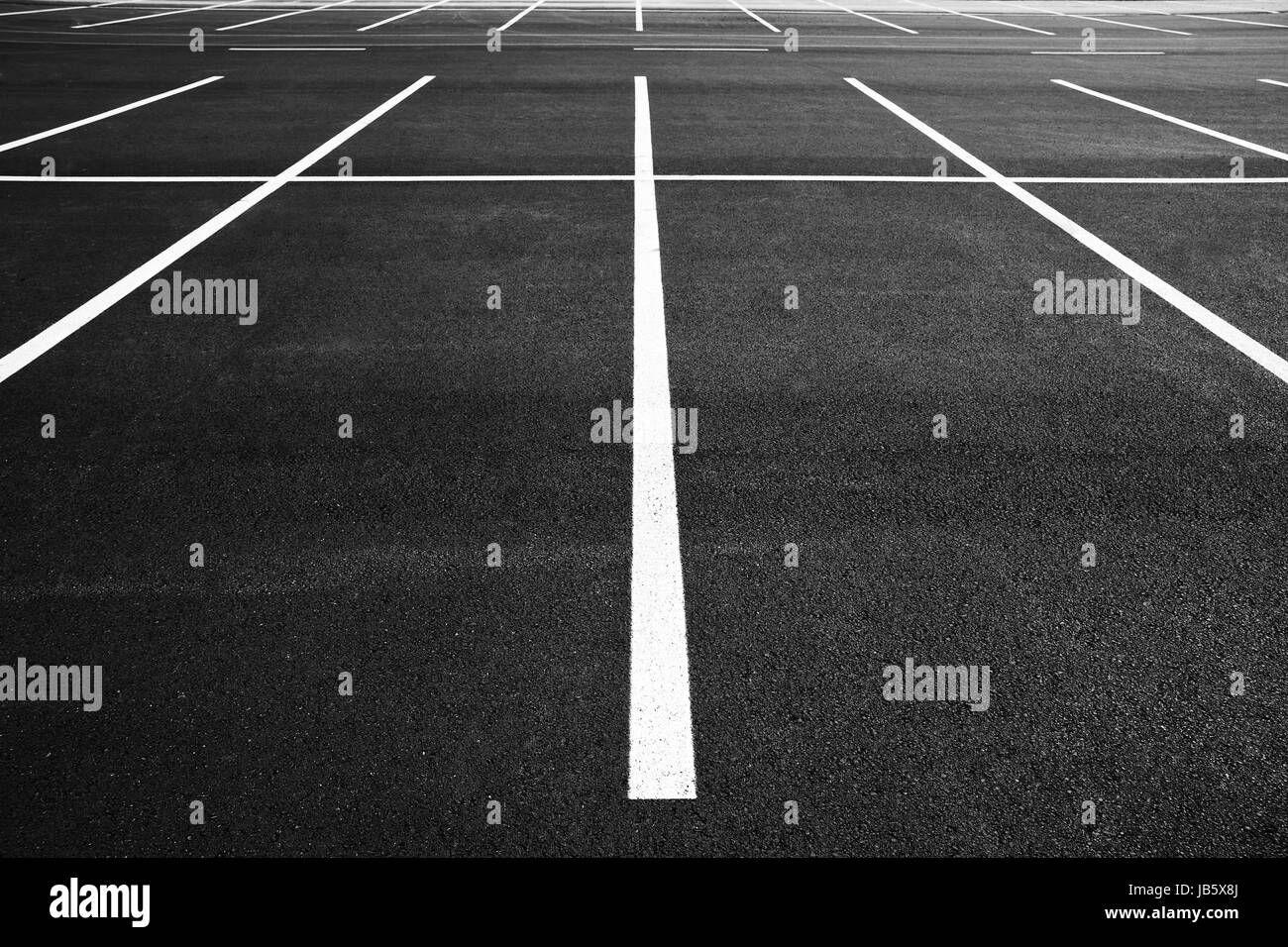 Arrow symbol on road Black and White Stock Photos & Images - Alamy