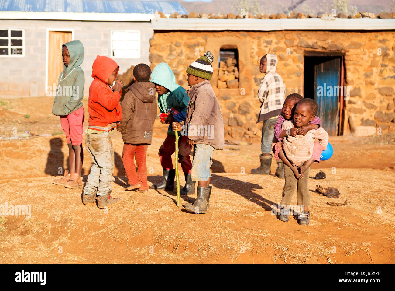 in africa group of alone children near their poor home Stock Photo - Alamy