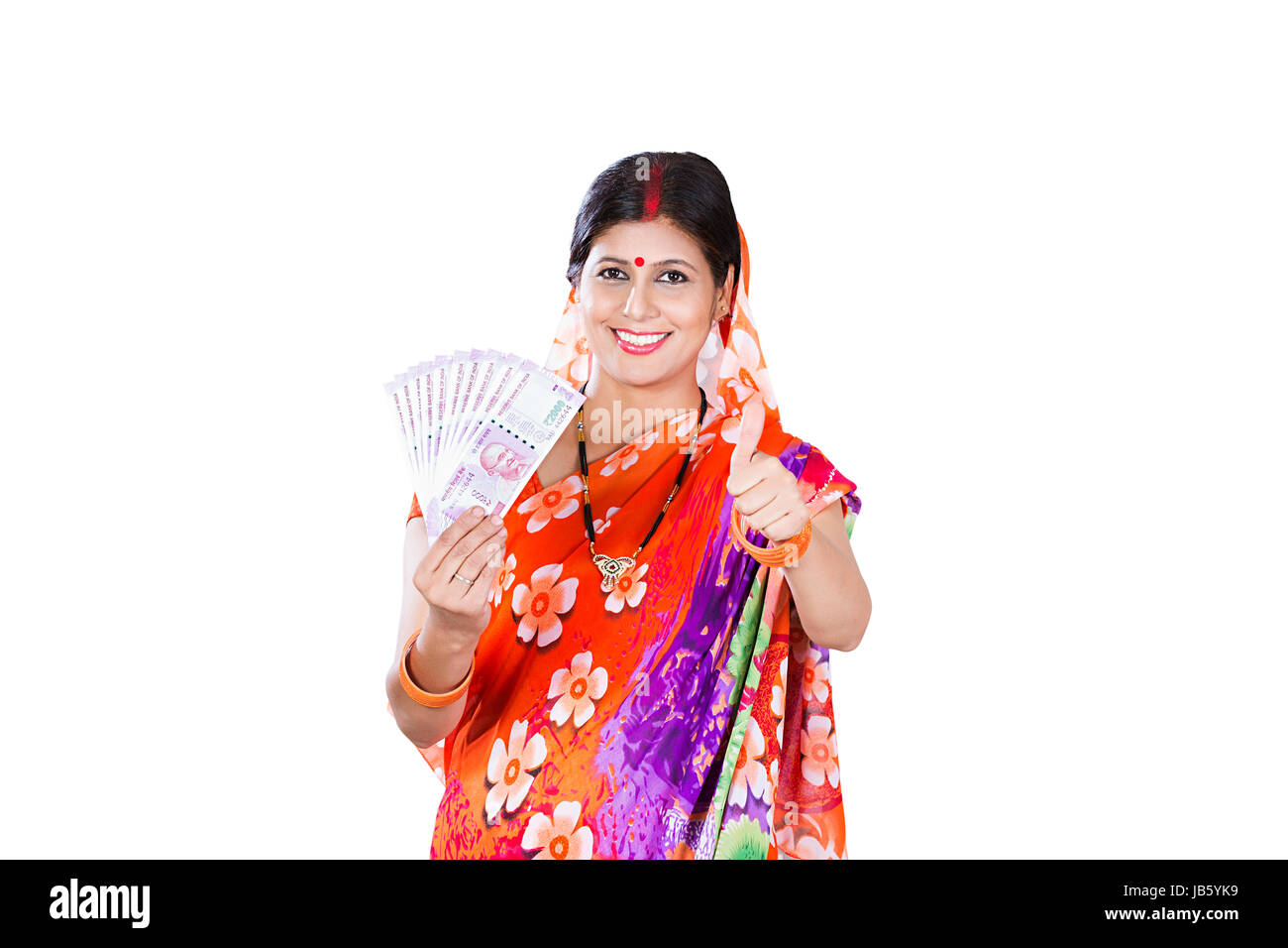 Happy 1 Indian Rural woman showing thumbs-up with Rupees Notes Money ...