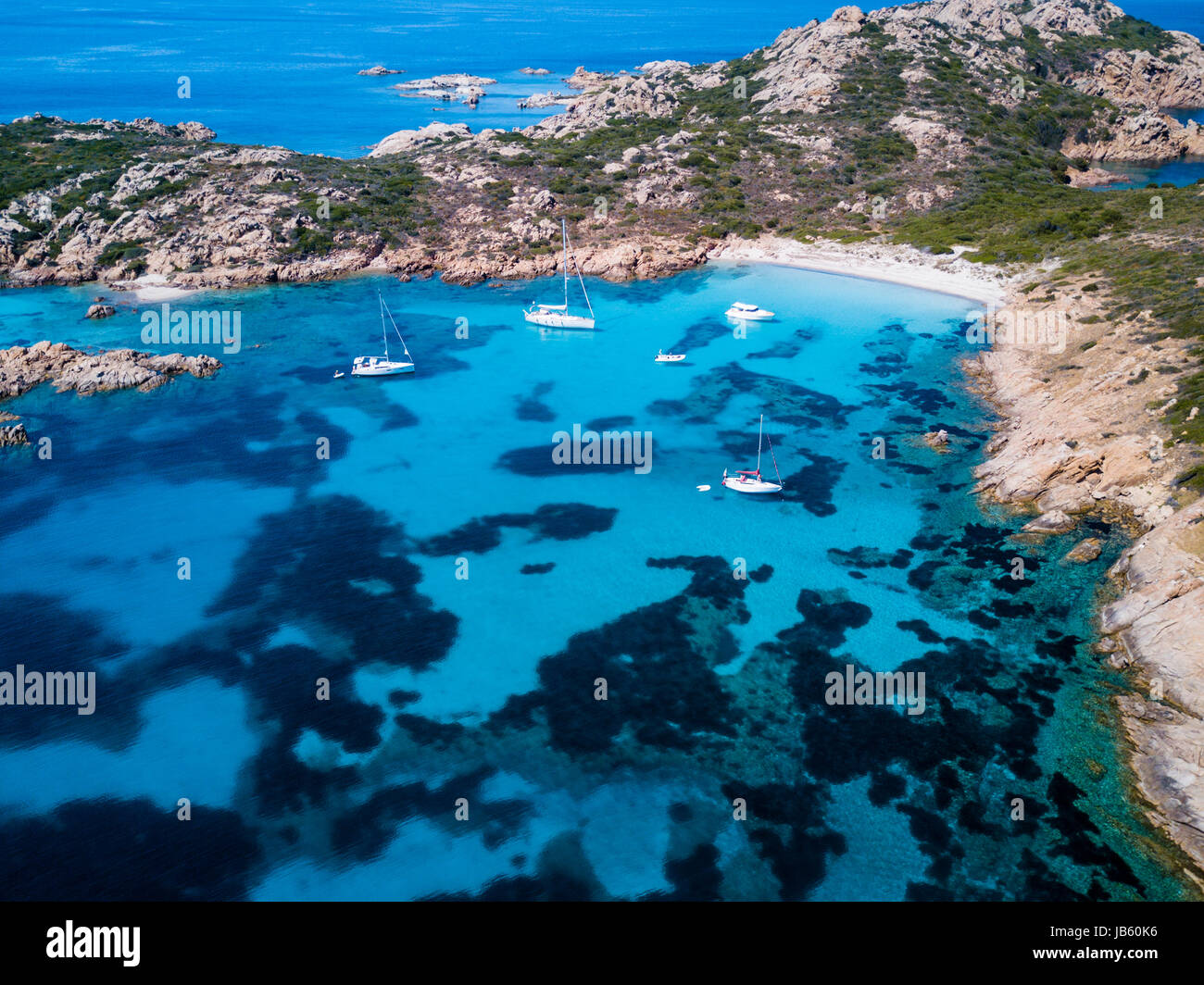 Aerial view of boats in front of Mortorio island in Sardinia. Amazing ...