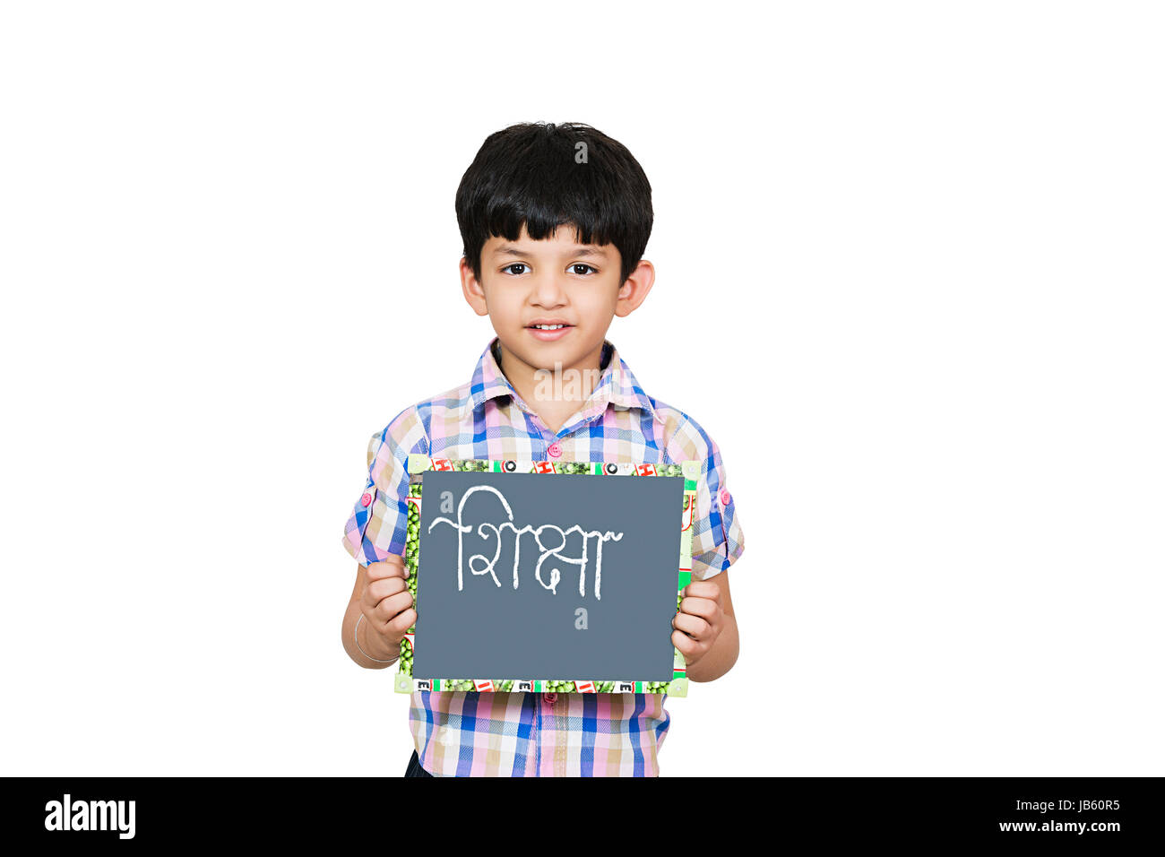 1 Indian Rural Child Boy Student in showing a writing slate Board On ...