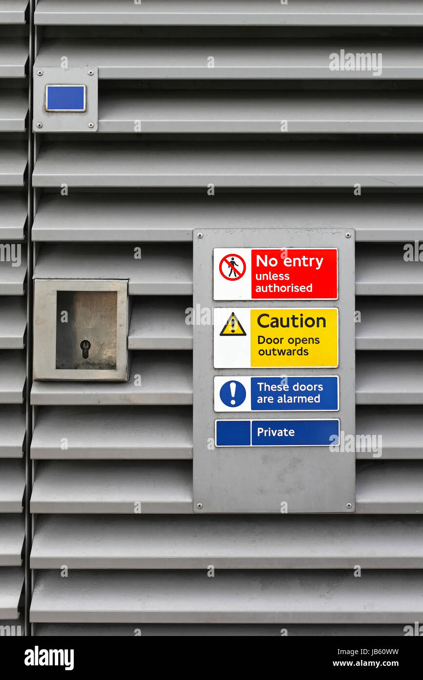 Safety signs caution outside door hi-res stock photography and images ...