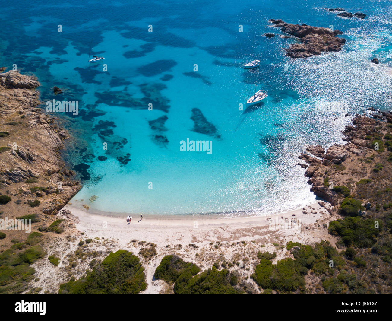 Aerial view of a sail boat in front of Mortorio island in Sardinia ...