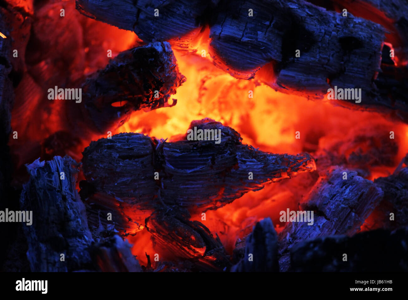 A beautiful evening fire melting away with red coals Stock Photo - Alamy