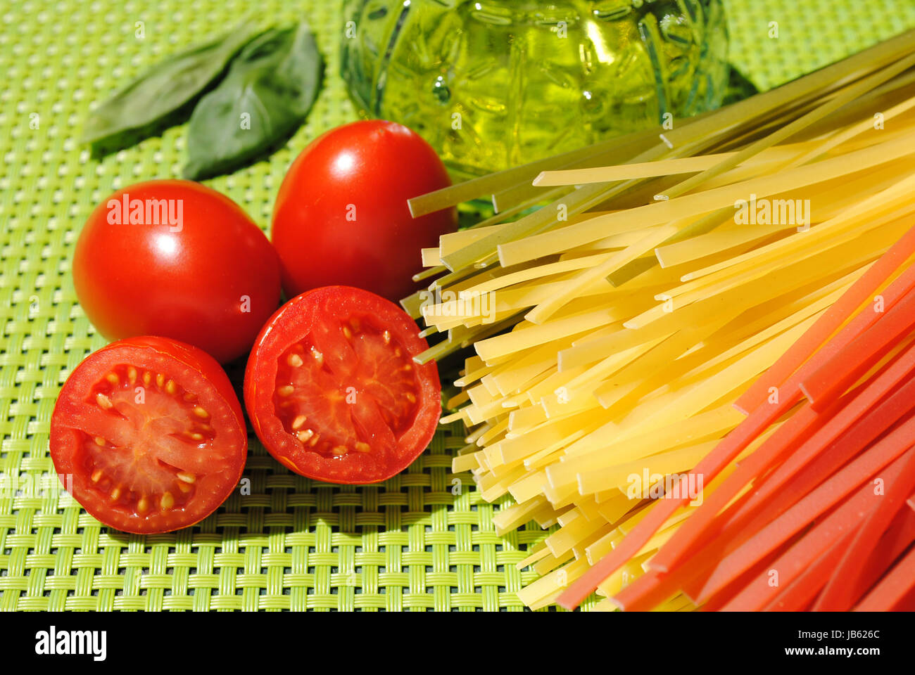 Italian spaghetti with the colors of the Italian flag Stock Photo - Alamy