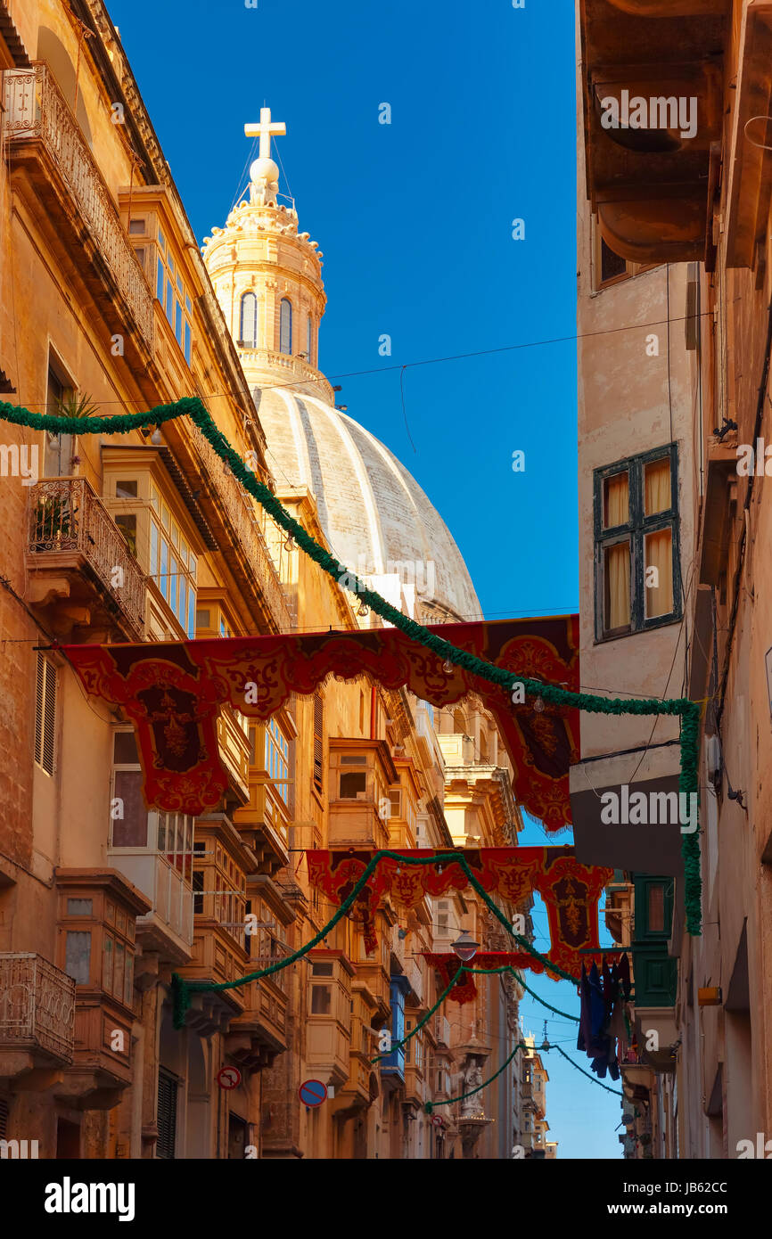Valletta street scene with balconies hi-res stock photography and ...