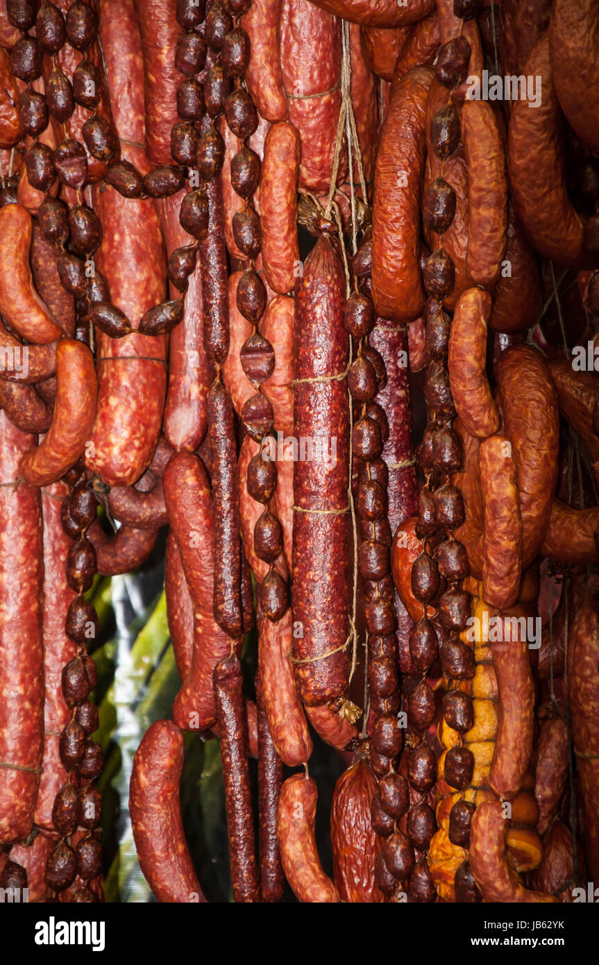 Smoked sausage, Salami, dry sausage with herbs Stock Photo - Alamy