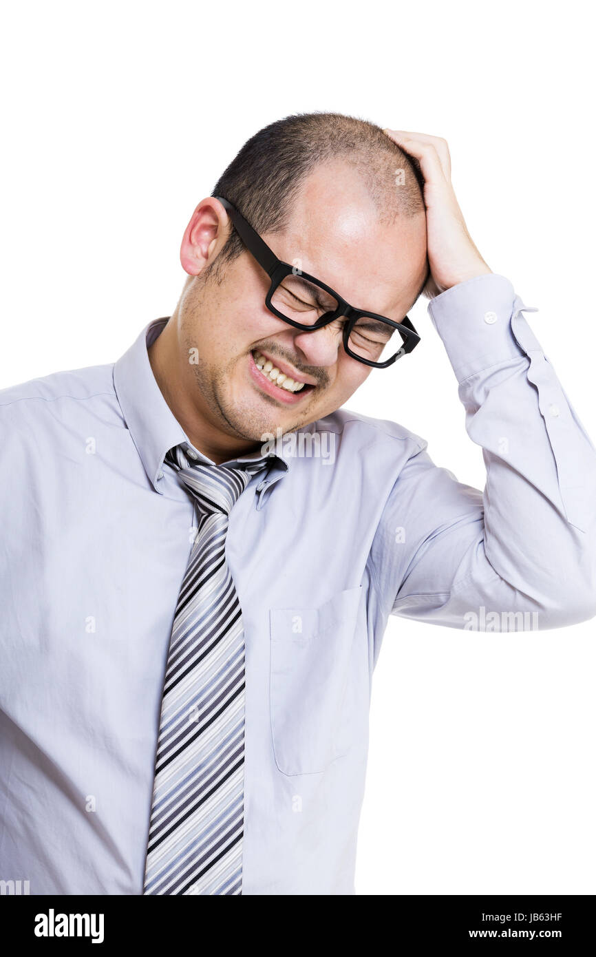 Businessman scratching his head Stock Photo - Alamy
