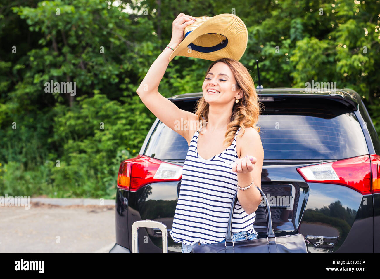 Summer vacation car road trip freedom concept. Happy woman cheering ...