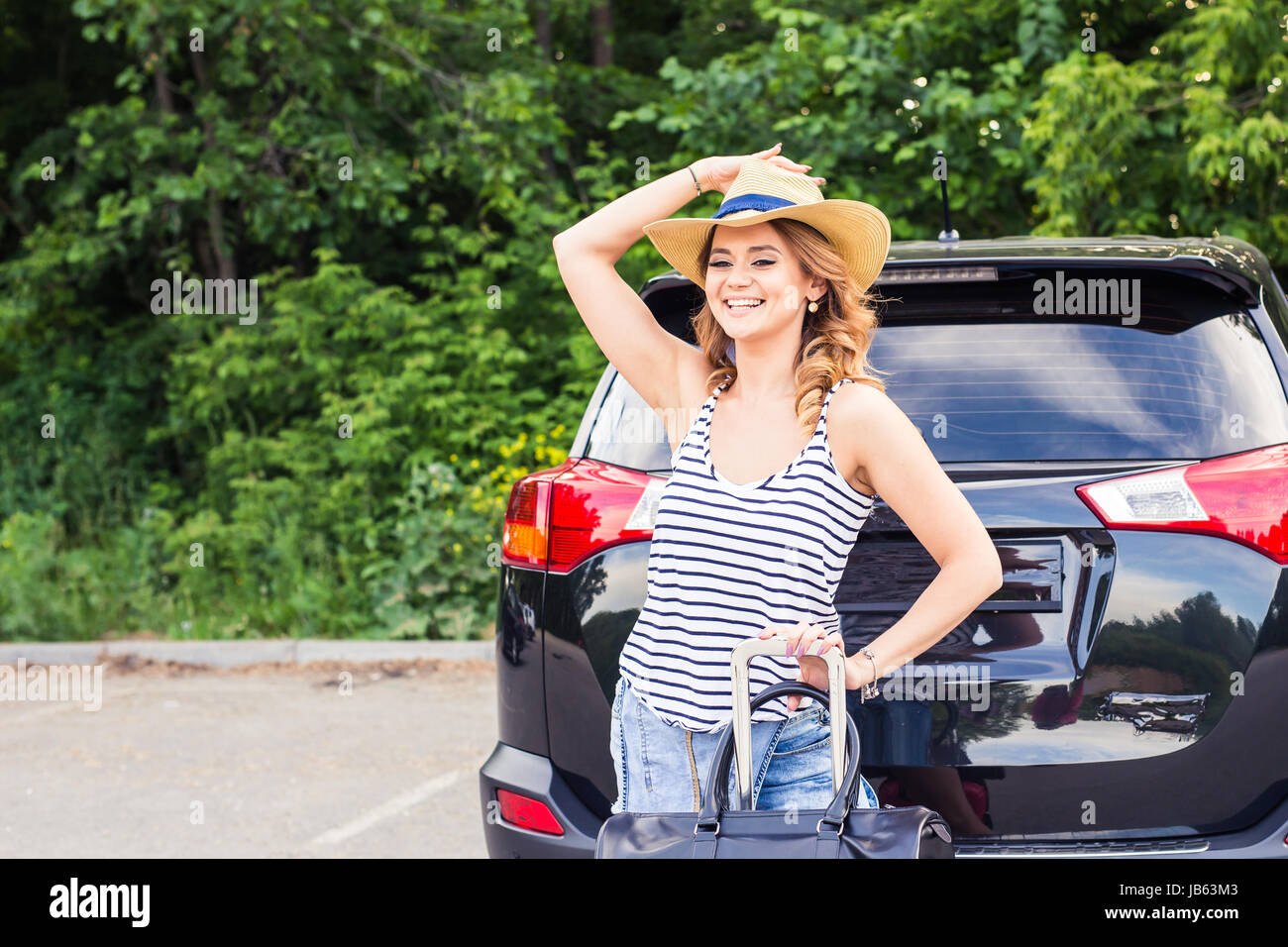 Summer vacation car road trip freedom concept. Happy woman cheering ...