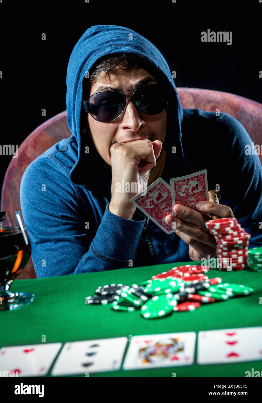 Man sitting poker table hi-res stock photography and images - Alamy