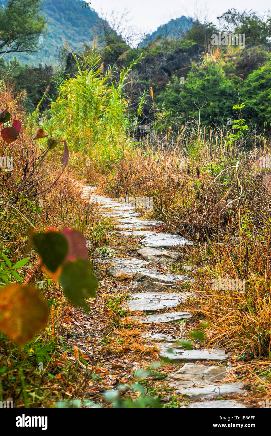 The hiking pathway scenery in the rural area Stock Photo - Alamy