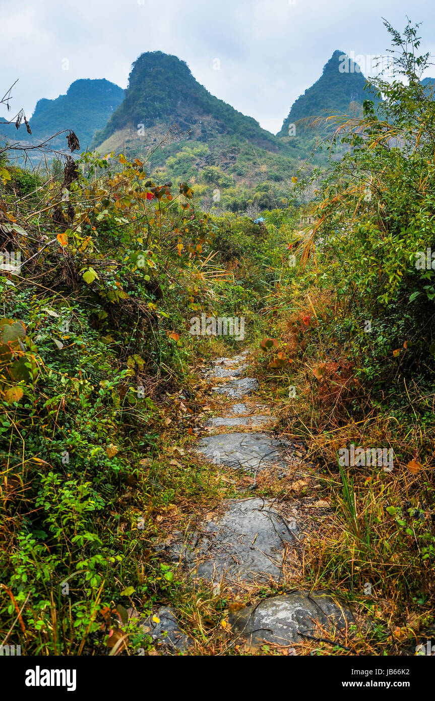 The hiking pathway scenery in the rural area Stock Photo - Alamy