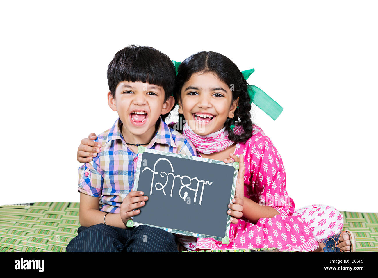 2 Indian Rural Kids Boy and Girl Sitting On Cot Together And Showing ...