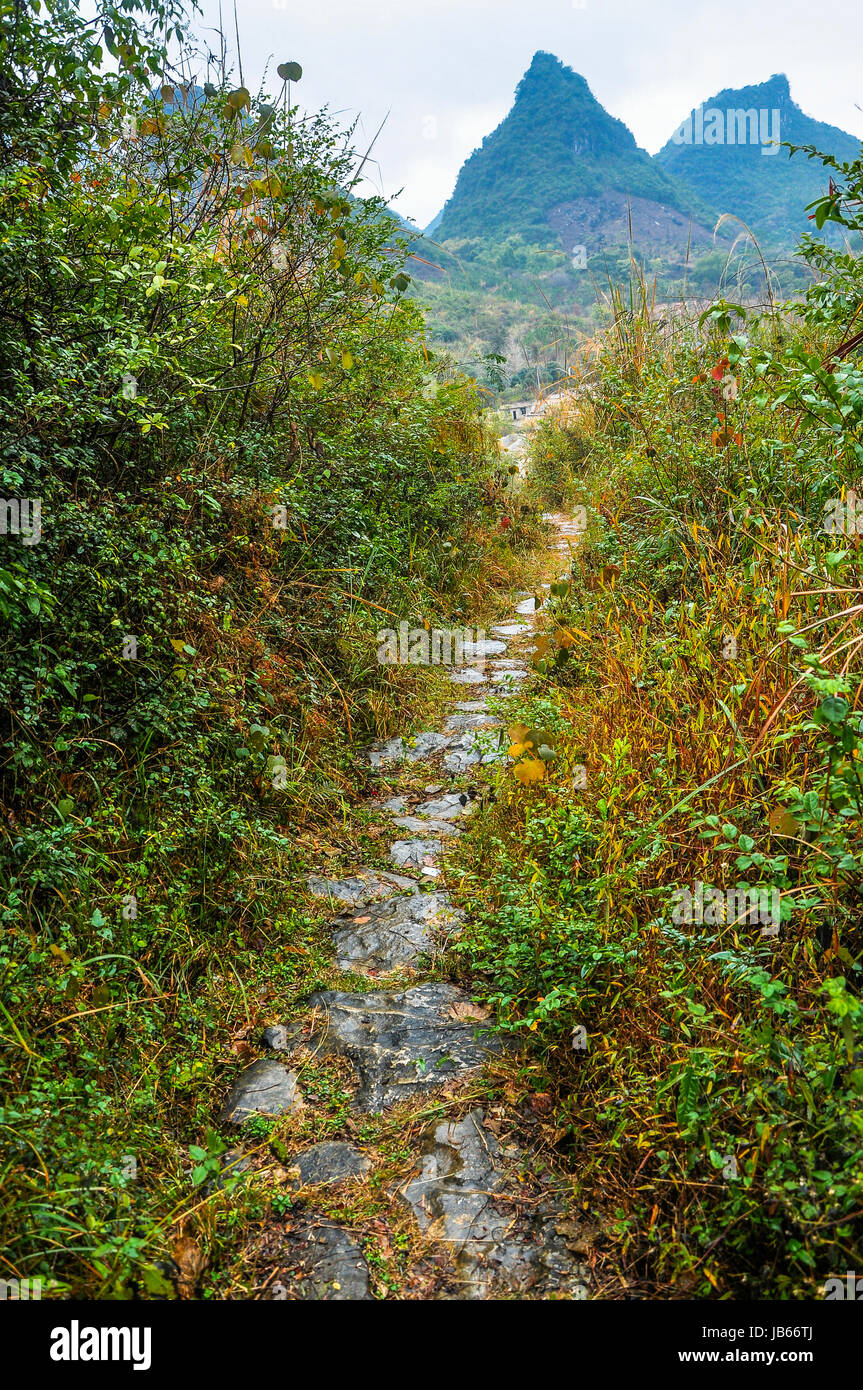 The hiking pathway scenery in the rural area Stock Photo - Alamy
