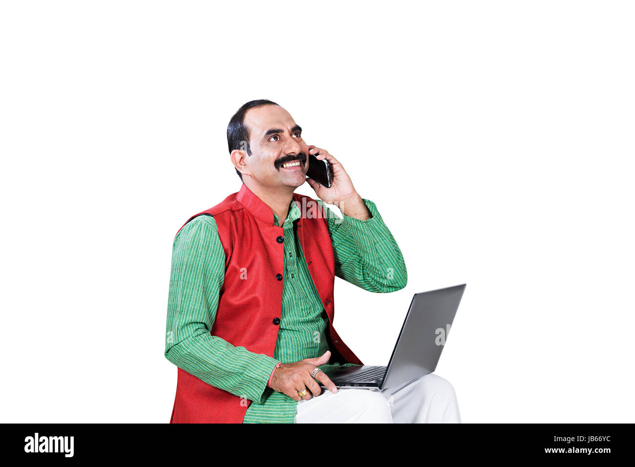 1 Indian Rural Man Using Laptop with Talking Phone Smiling On White ...